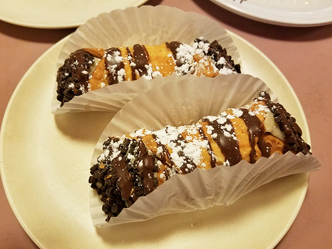Cannoli with chocolate-dipped ends&mdash;because after conquering a Detroit pizza mountain, you deserve a sweet victory flag.