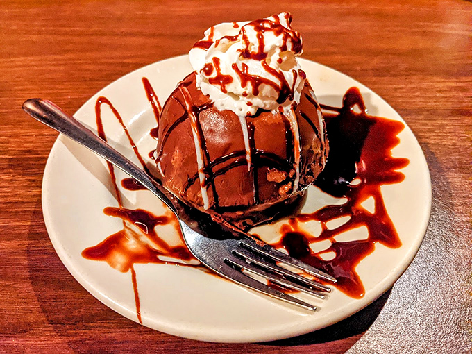 The Chocolate Mousse Tuxedo Bombe dressed more formally than most of the guests. Dessert that's both elegant and worth unbuttoning your pants for.