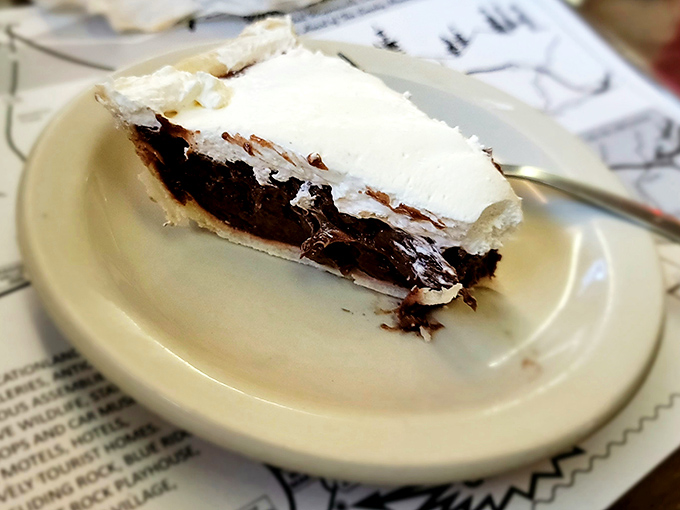That chocolate cream pie isn't trying to be fashionable; it's too busy being absolutely perfect. Save room or regret it forever.