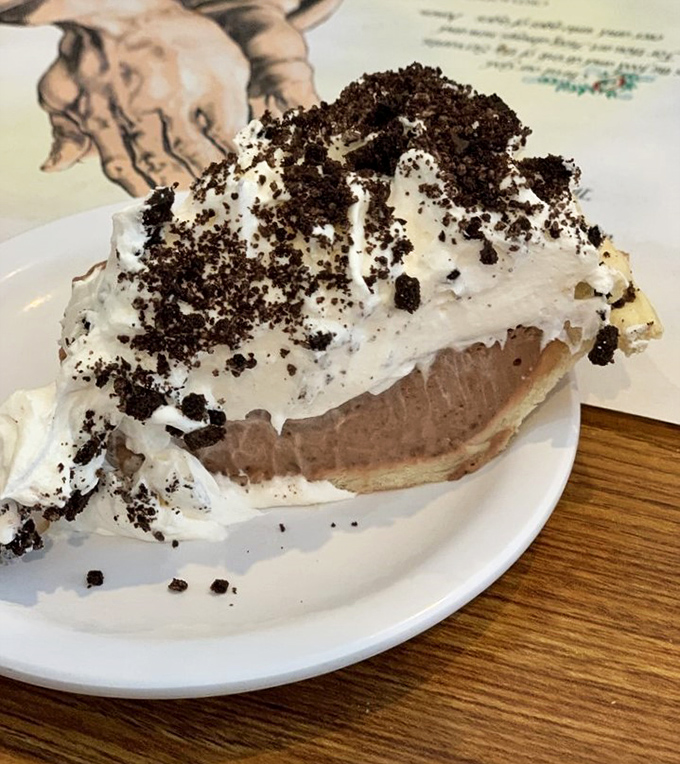 At the counter, homemade pies and desserts stand at attention like beauty pageant contestants, each one vying for the title of "Most Likely to Destroy Your Diet."
