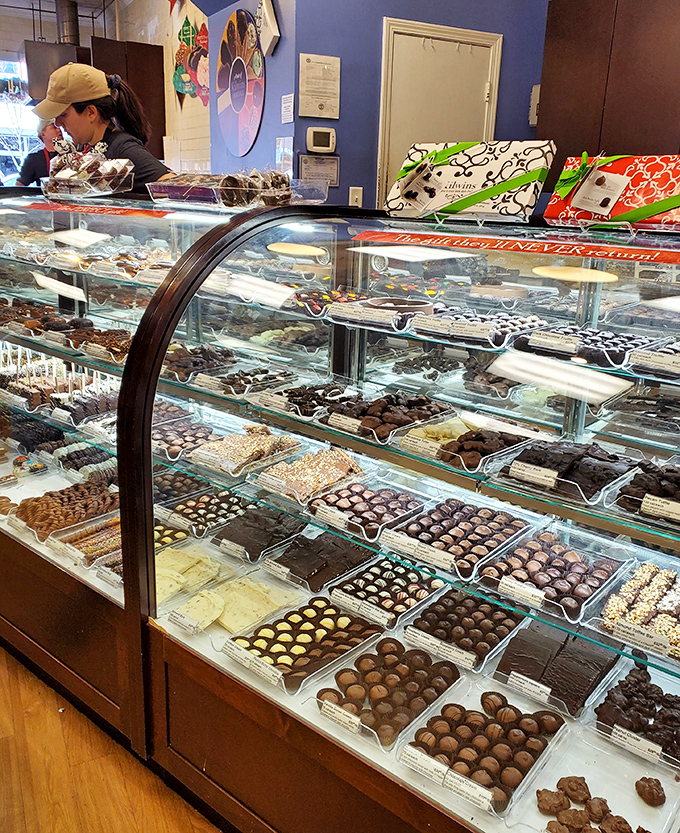 Not a dessert display &ndash; a treasure chest of chocolate temptations that would make Willy Wonka consider a career change.