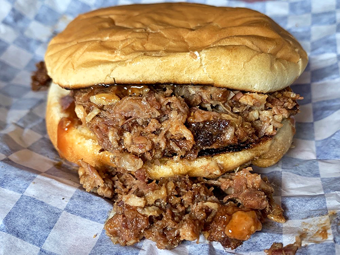 This isn't just a chopped beef sandwich&mdash;it's a masterpiece of texture and flavor that requires both napkins and your complete attention.