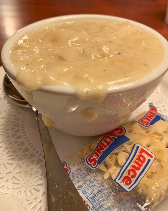 Clam chowder thick enough to stand a spoon in, served with oyster crackers that beg to be dunked into this creamy ocean of comfort.