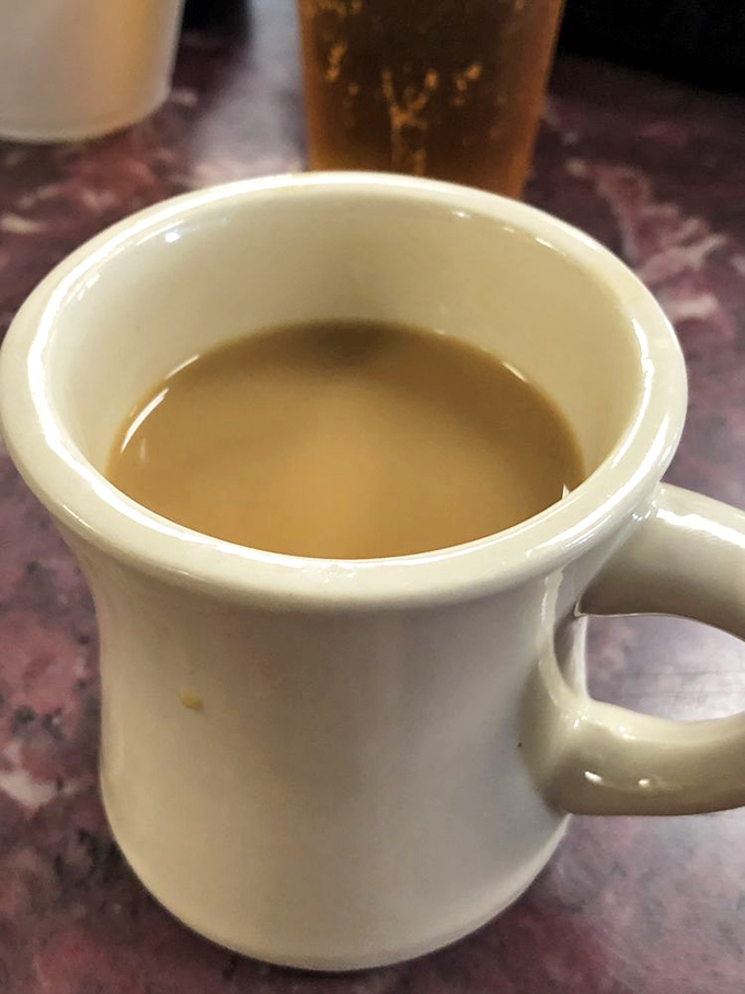 Coffee at Clary's isn't just a beverage—it's morning motivation in ceramic form, keeping conversations flowing as steadily as the refills.