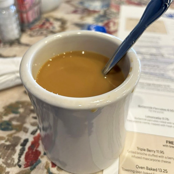 The elixir of morning warriors, served in a sturdy white mug. This isn't just coffee—it's liquid motivation.