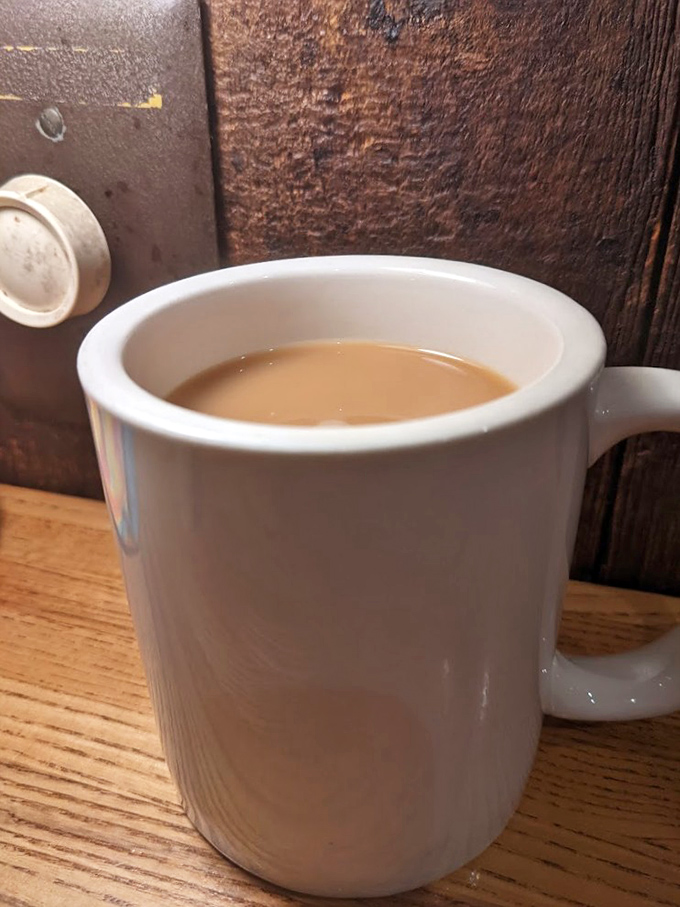The humble coffee mug &ndash; steadfast companion to countless conversations, deal-makings, and dessert deliberations within these wooden walls.