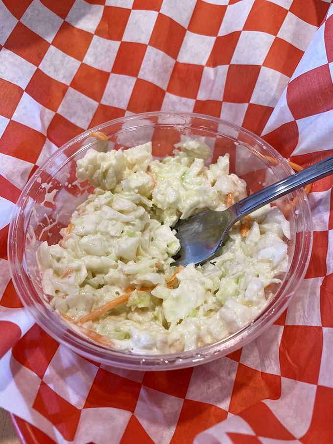 Creamy, crunchy cabbage perfection. This isn't your bland afterthought coleslaw&mdash;it's a worthy companion to the main event, bright and fresh with just the right amount of dressing.