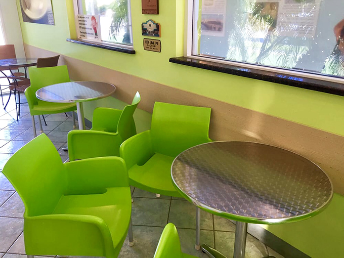 Bright green chairs invite lingering conversations about life's simple pleasures and extraordinary dessert discoveries.