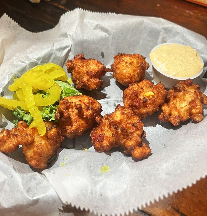 Golden conch fritters offer bite-sized pieces of Caribbean sunshine that'll transport you to tropical paradise.