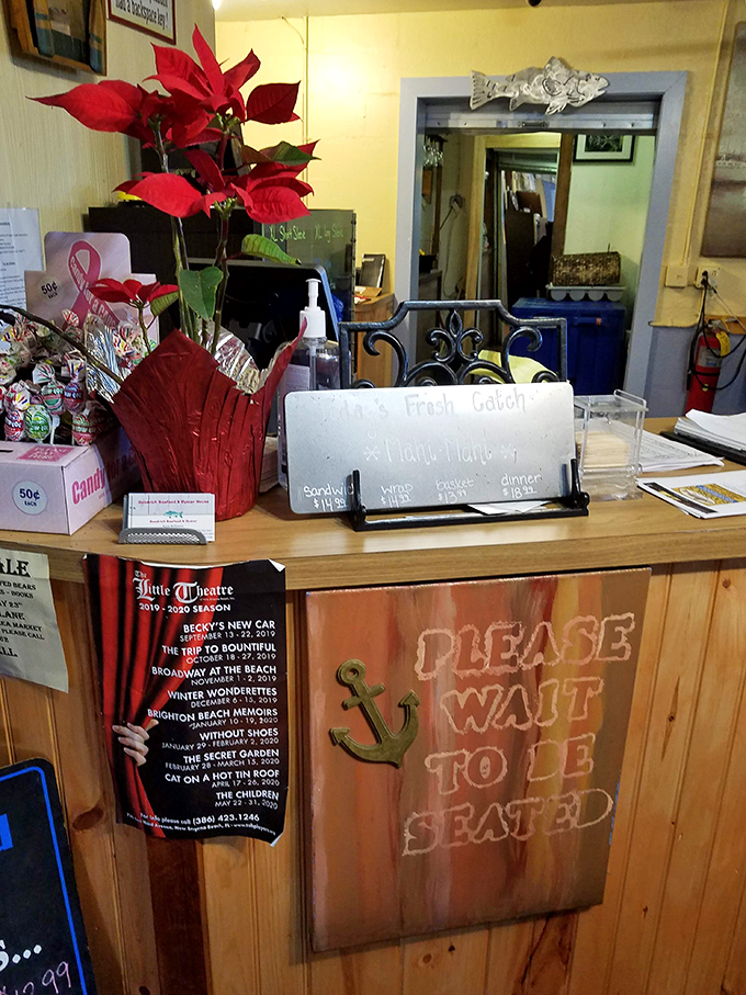 "Please wait to be seated" never looked so inviting. The poinsettias add a touch of Florida charm to this welcoming entrance.