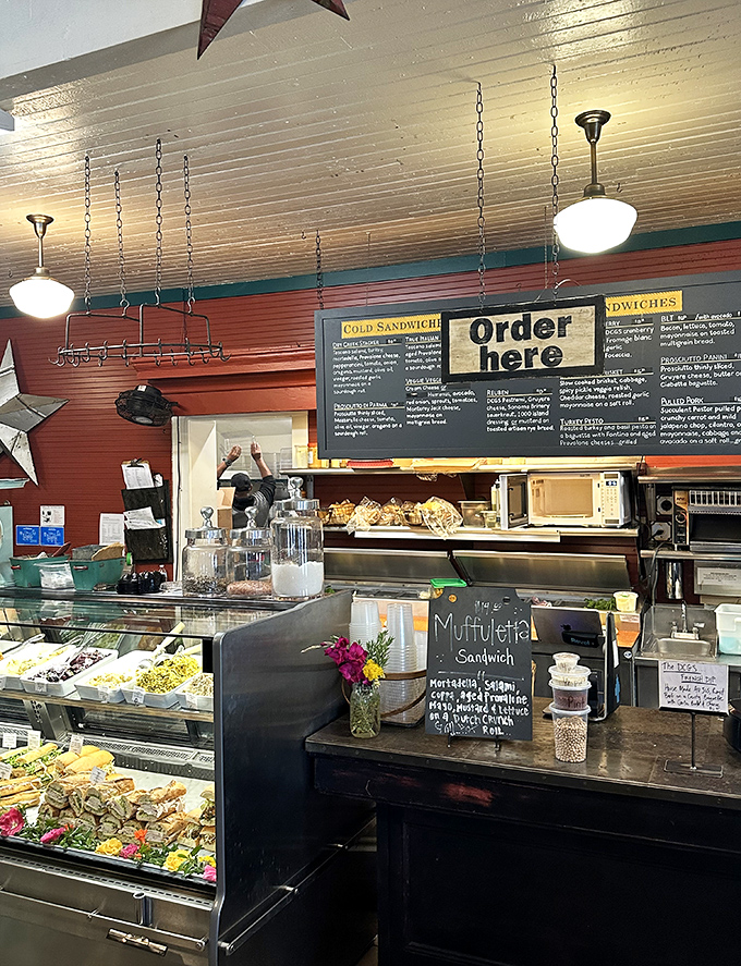 At the counter, where sandwich magic happens, handwritten specials remind us that the best menus aren't printed but created daily.