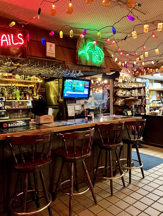 The bar at The Fish House isn't just where drinks are served; it's where fishing tales grow by at least two inches with each retelling.