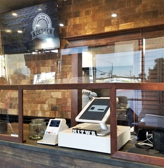 The humble command center where burger dreams become reality. Behind that counter, culinary magic happens with surprising efficiency.