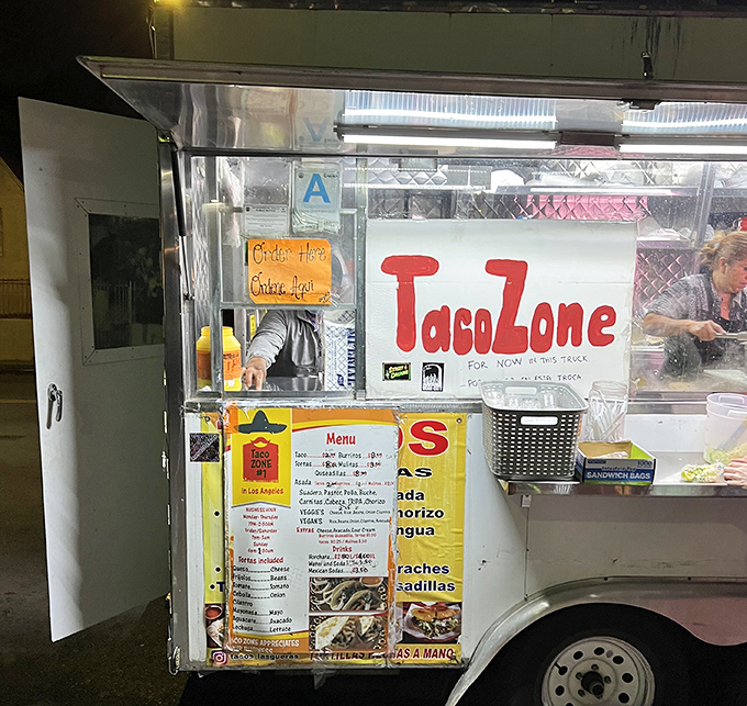 The ordering window—that magical portal where your desires transform into reality, facilitated by the hardworking wizards of the flat-top grill.