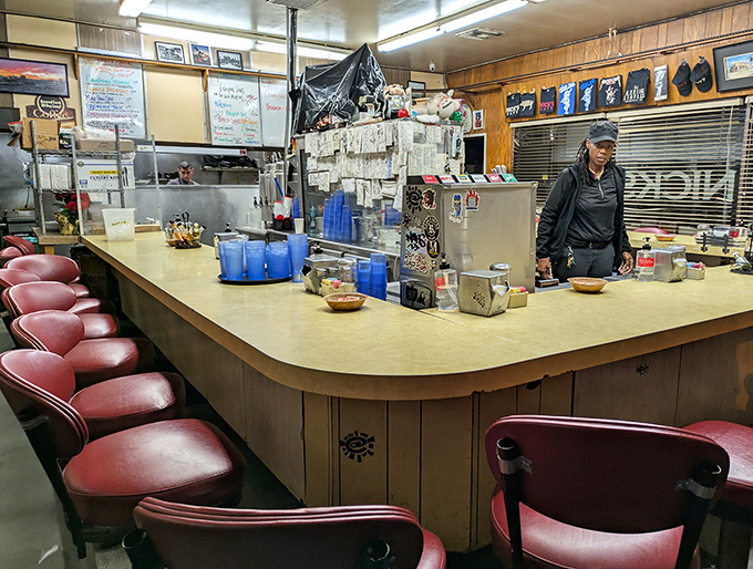 The horseshoe counter isn't a design choice&mdash;it's breakfast theater in the round, where you're both audience and participant in the morning ritual.