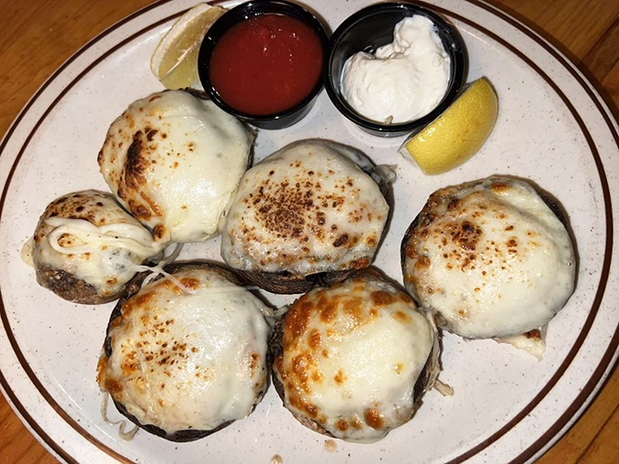 These mushrooms aren't just stuffed&mdash;they're overachievers, wearing melted cheese jackets and ready to start your meal with a standing ovation.
