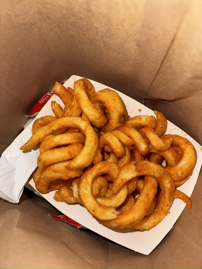 These curly fries are like the jazz musicians of the fried potato world&mdash;they improvise their way into your heart.
