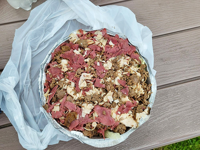 A mountain of meats and cheeses in aluminum-pan glory. Proof that salad can indeed be a celebration rather than a punishment.
