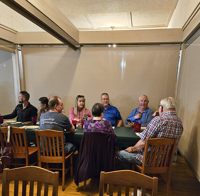 Private dining areas where conversations flow as freely as the gravy. These wooden chairs have witnessed countless celebrations, confessions, and food comas.