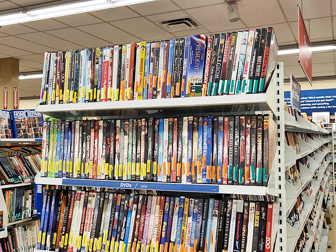 The DVD wall&mdash;a physical Netflix from the before times&mdash;where forgotten sequels and impulse purchases find their second act.