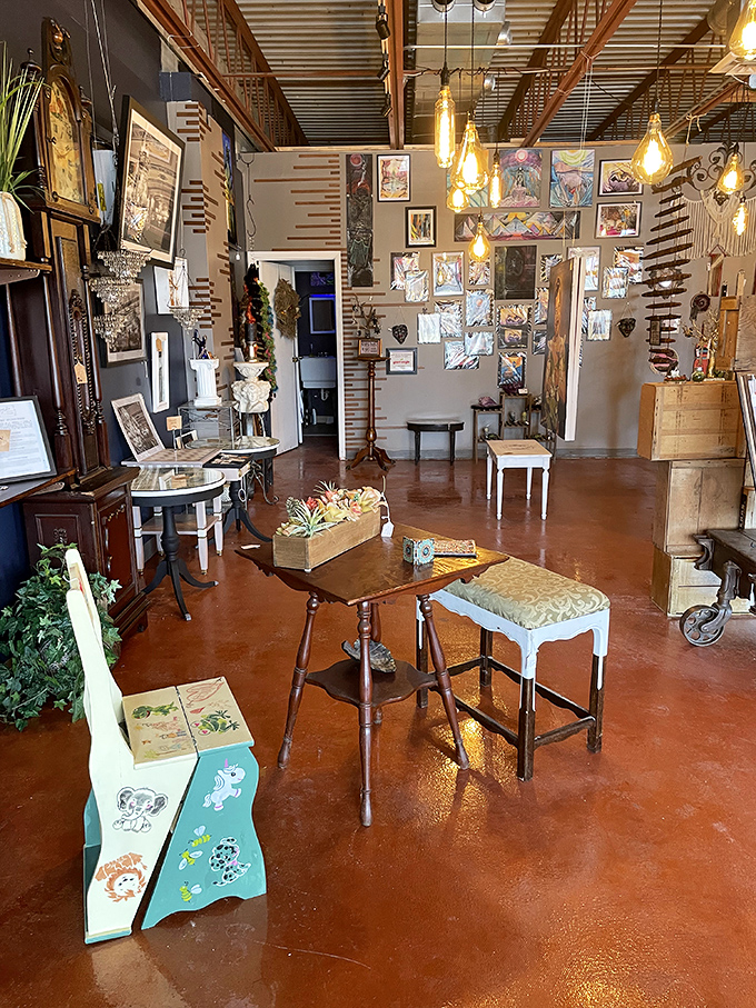 Edison bulb heaven meets gallery wall goals. This artsy corner with its warm copper lighting feels like Brooklyn moved to Ohio and brought its coolest apartment.