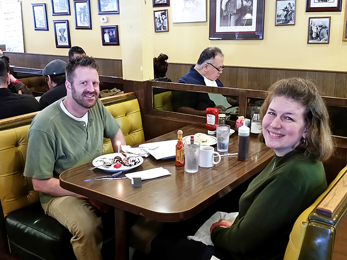 Happy diners caught in their natural habitat&mdash;the universal expression of people about to enjoy something delicious.