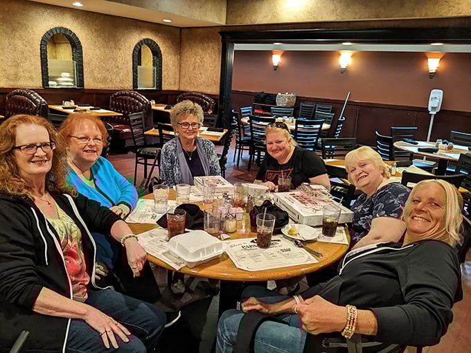 Where memories are made between bites&mdash;friends gathering around a table, proving that the best ingredient in any meal is the company you share it with.