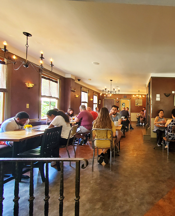 The dining room hums with the satisfied murmurs of locals who've learned that waiting for a table here is like investing in guaranteed happiness.
