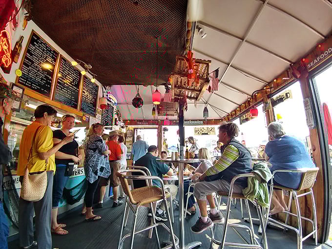 The ordering counter doubles as a culinary command center, where seafood dreams are processed and ocean-to-table magic begins.