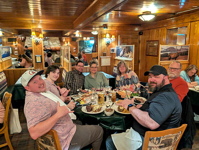 Happy diners caught in their natural habitat – the universal expression of "we ordered too much but regret nothing" written across every smiling face.