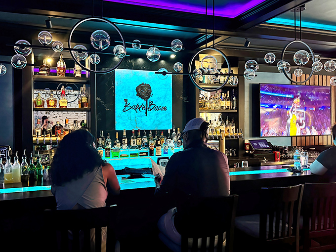 Where cocktails meet conversation. The circular pendant lights create a mood that says, "Stay awhile, the calories don't count if you're having fun."