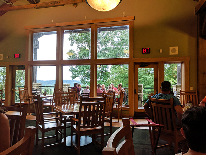 The floor-to-ceiling windows transform an ordinary meal into dinner theater, with the rolling hills of southeastern Ohio as the stage.
