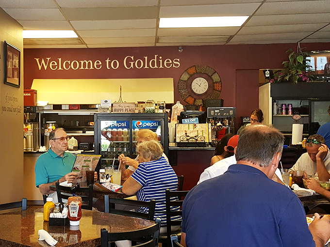 Where regulars become family&mdash;Goldie's dining room buzzes with conversation and coffee refills under the watchful eye of a decorative wall clock.
