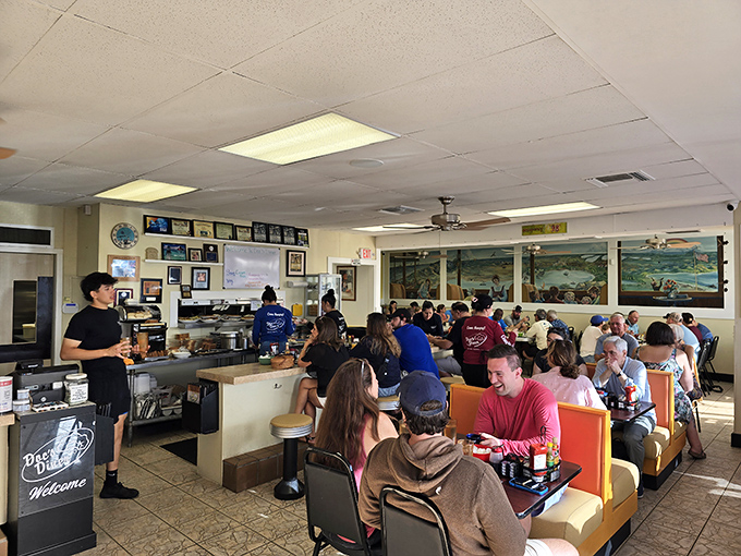 Morning magic happens when locals and visitors share space over steaming plates, creating that special alchemy only found in beloved diners.