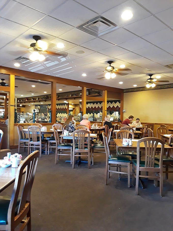 The dining room hums with the satisfied murmurs of regulars who've been coming here since before avocado toast was invented.