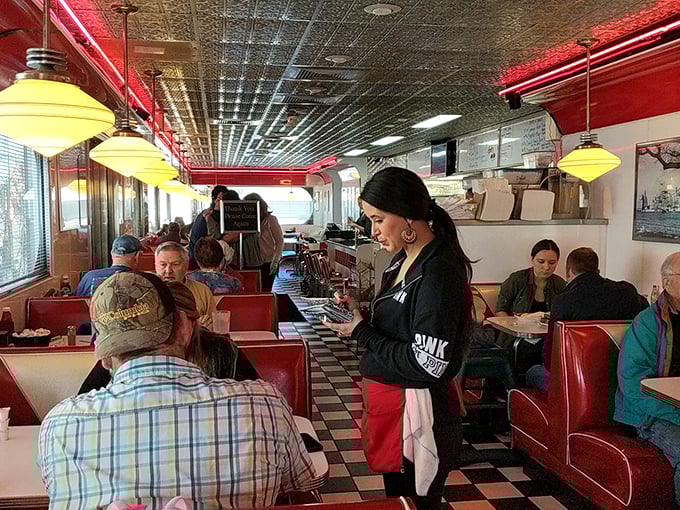 Where strangers become neighbors over coffee refills and shared appreciation for plates that arrive with food spilling over the edges.