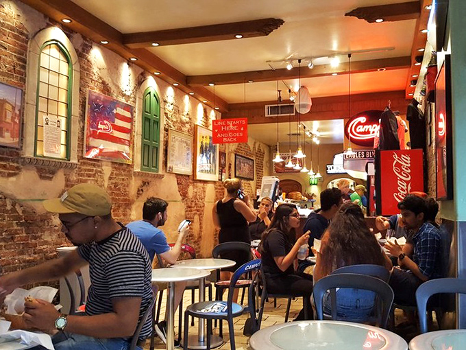 A cross-section of Philadelphia life converges at Campo's &ndash; where suits, tourists, and locals find common ground in sandwich appreciation.