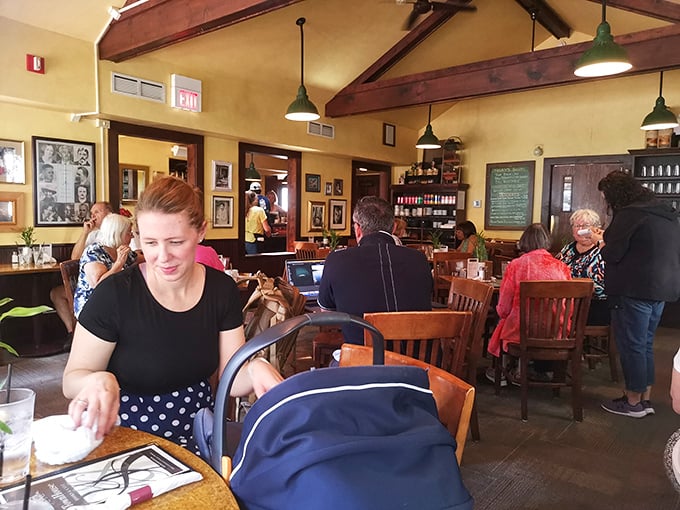 Where locals gather to debate everything from bestseller lists to baseball scores, proving that good coffee and comfortable chairs are civilization's greatest achievements.