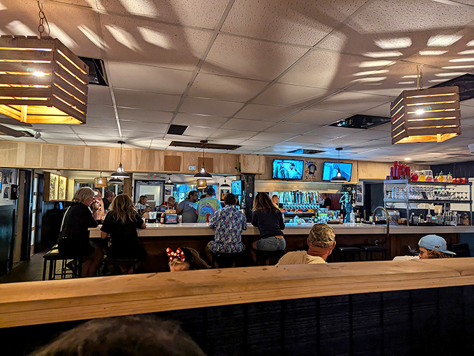 The bar area hums with the universal language of good times&mdash;cold drinks, warm conversation, and seafood anticipation.