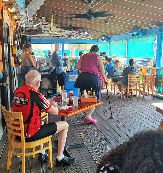 A full house of happy diners&mdash;the universal language of "mmm" transcends all barriers when grouper this good is involved.