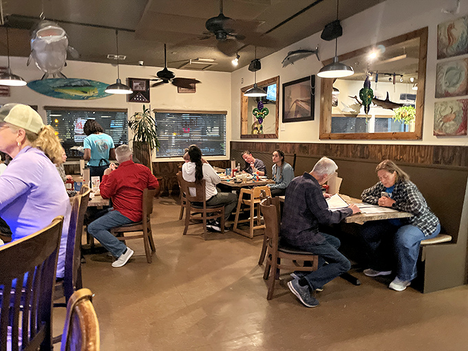 Where locals and visitors unite in the universal language of "pass the hot sauce." The packed tables speak volumes about Mike's reputation.