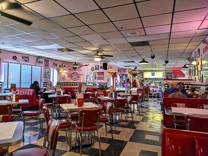 The bustling dining room hums with conversation and clinking silverware. Pink walls and vintage decor create the perfect backdrop for memory-making.