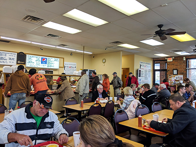 When the dining room fills up at OJ's, you're not just getting a meal - you're getting a cross-section of Greenville life seated at wooden tables.