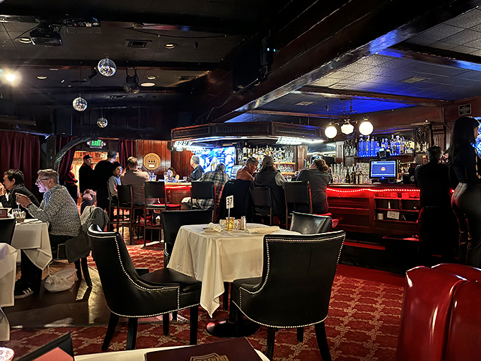 The bar area buzzes with the energy of decades of deal-making, celebration, and the occasional celebrity sighting. Every seat tells a story.