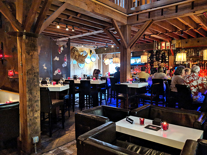 Where conversations flow as smoothly as the wine. The restaurant's thoughtful layout creates intimate dining spaces within the grand structure.