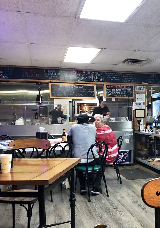 Where barbecue brings people together. The counter-service setup encourages conversation with strangers who quickly become friends over shared meat appreciation.