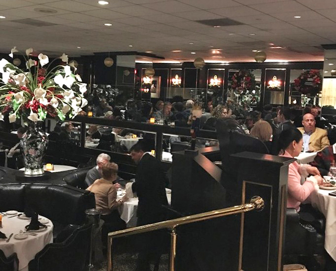 The dining room hums with the particular symphony of clinking glasses, murmured conversations, and the occasional delighted laugh of someone's first bite.