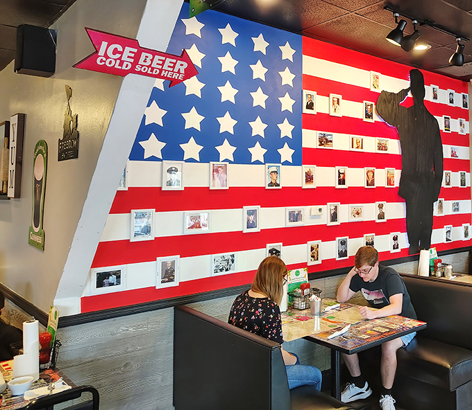 Diners: That magnificent American flag wall isn't just patriotic d&eacute;cor&mdash;it's a community photo album where locals have added their own memories to the stars and stripes.