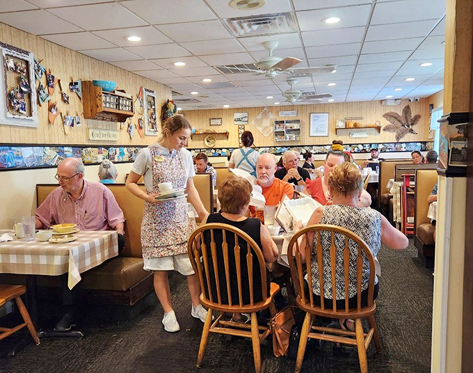 Where servers in traditional dress deliver plates of comfort food to tables of happy diners who know they've found Florida's best-kept secret. 