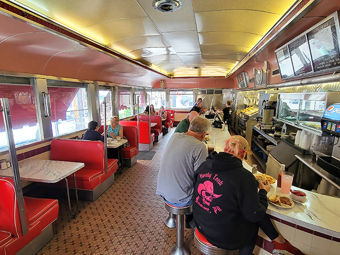 Where strangers become neighbors and neighbors become family—the diner's natural ecosystem in action, fueled by coffee and conversation.